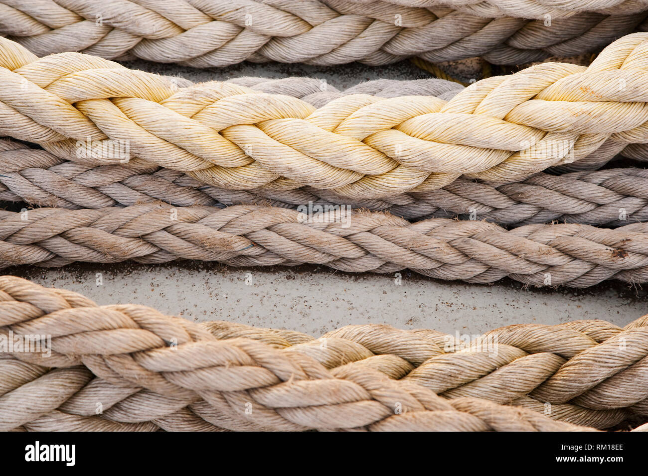 Coiled pile of ropes hi-res stock photography and images - Alamy