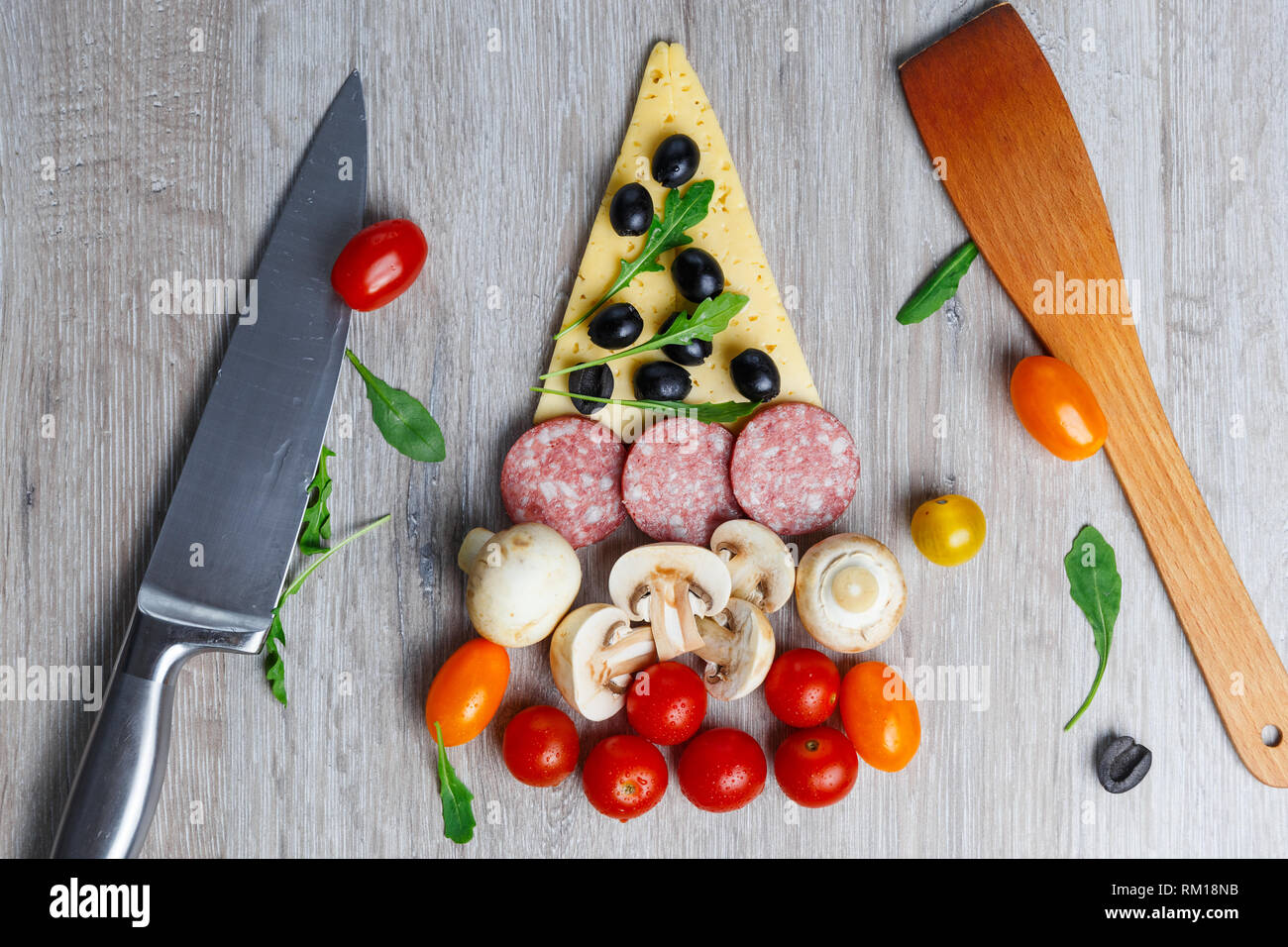 Creative composition of ingredients in the form of a slice of pizza ...