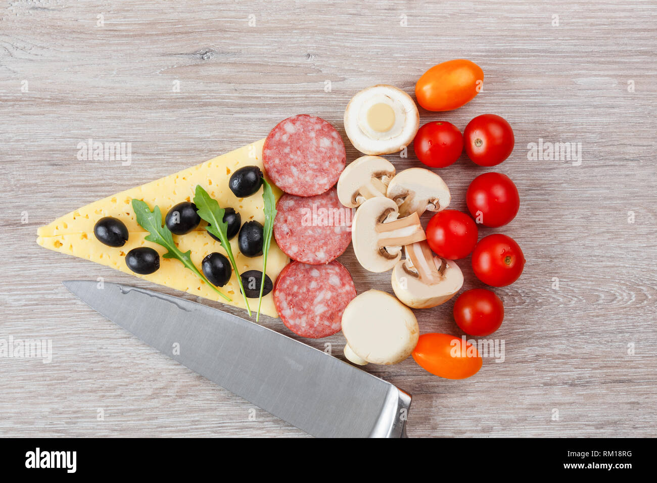 Creative composition of ingredients in the form of a slice of pizza ...
