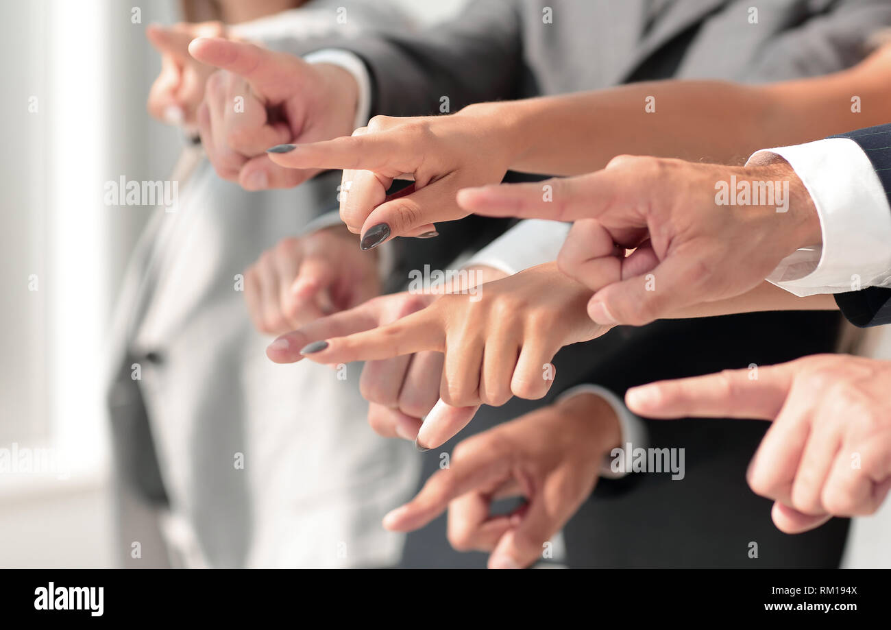 side view. hands the business team pointing at you Stock Photo - Alamy