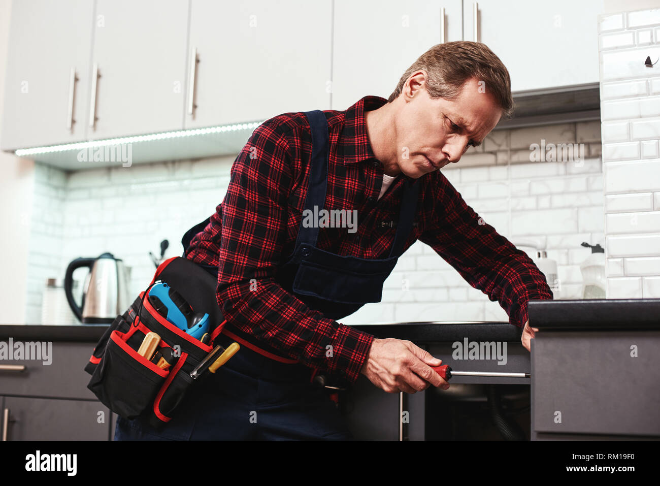 Handyman senior hi-res stock photography and images - Alamy