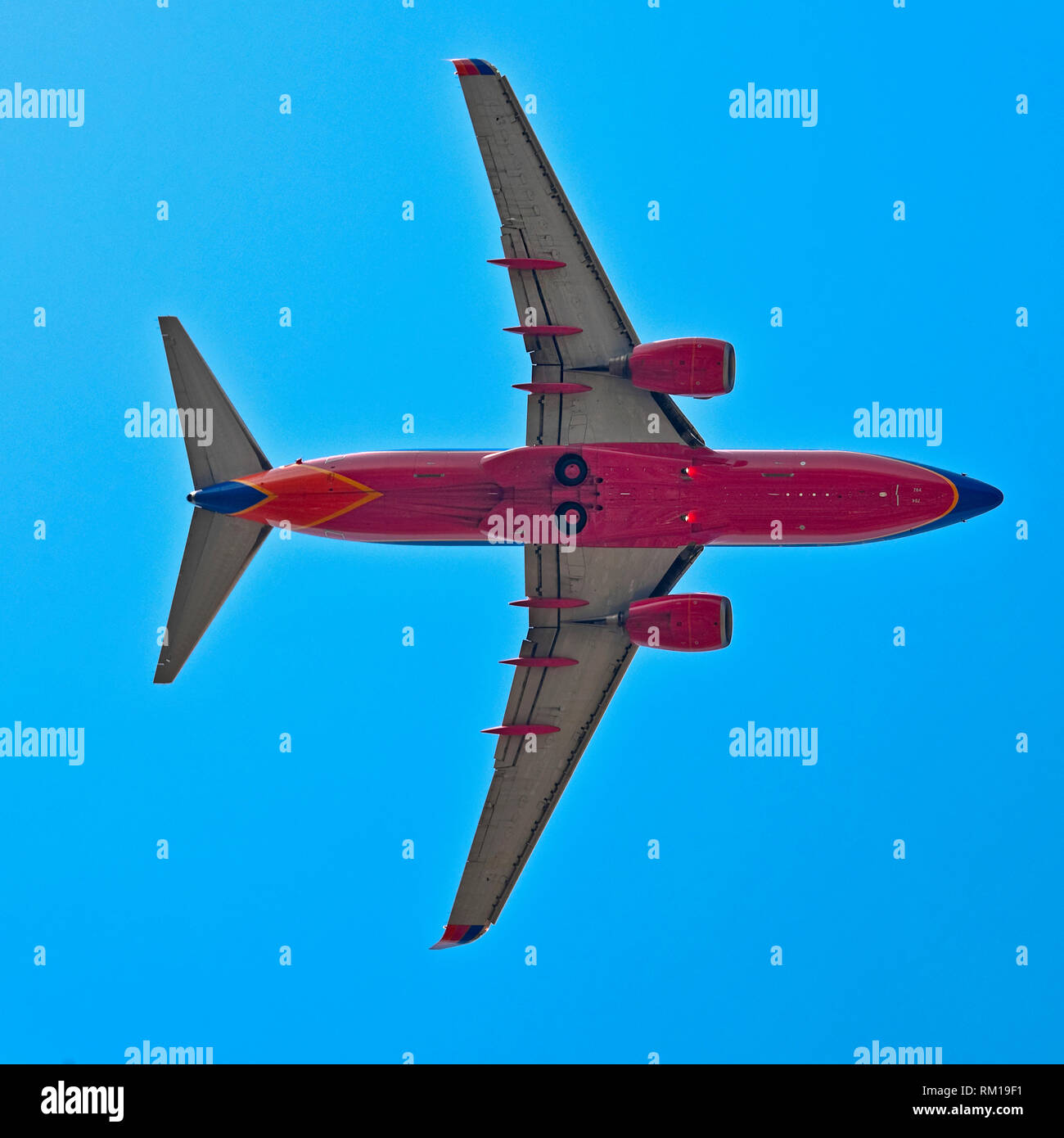 Worms Eye View of Jet Airplane Flying Stock Photo - Alamy