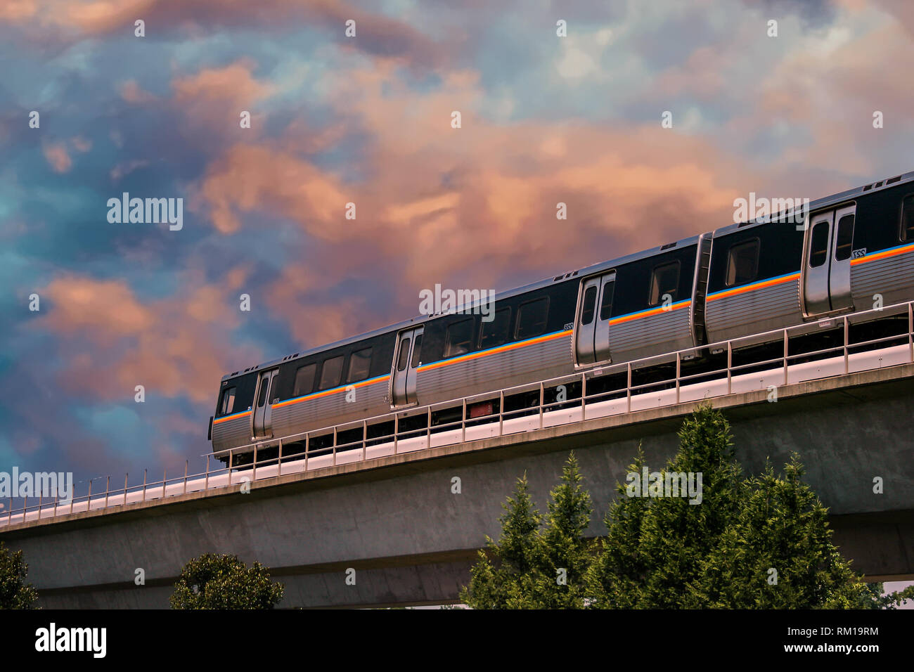 Subway train on elevated tracks Stock Photo - Alamy