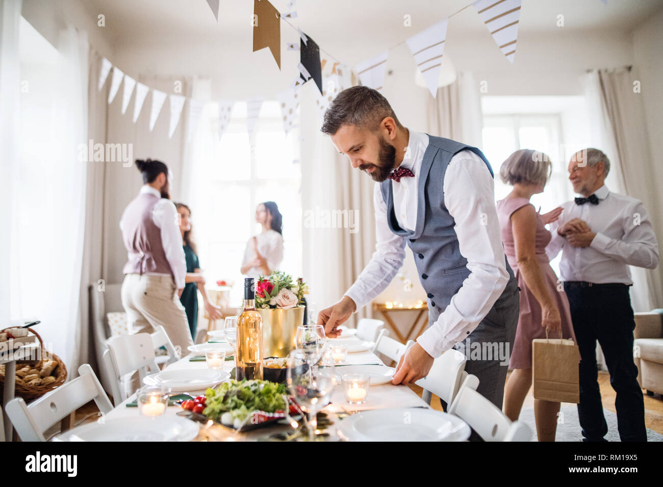 Man Setting The Table