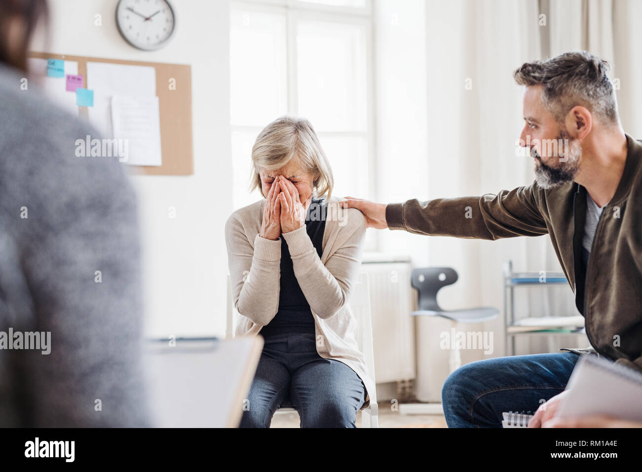 Woman crying during group therapy hi-res stock photography and images ...