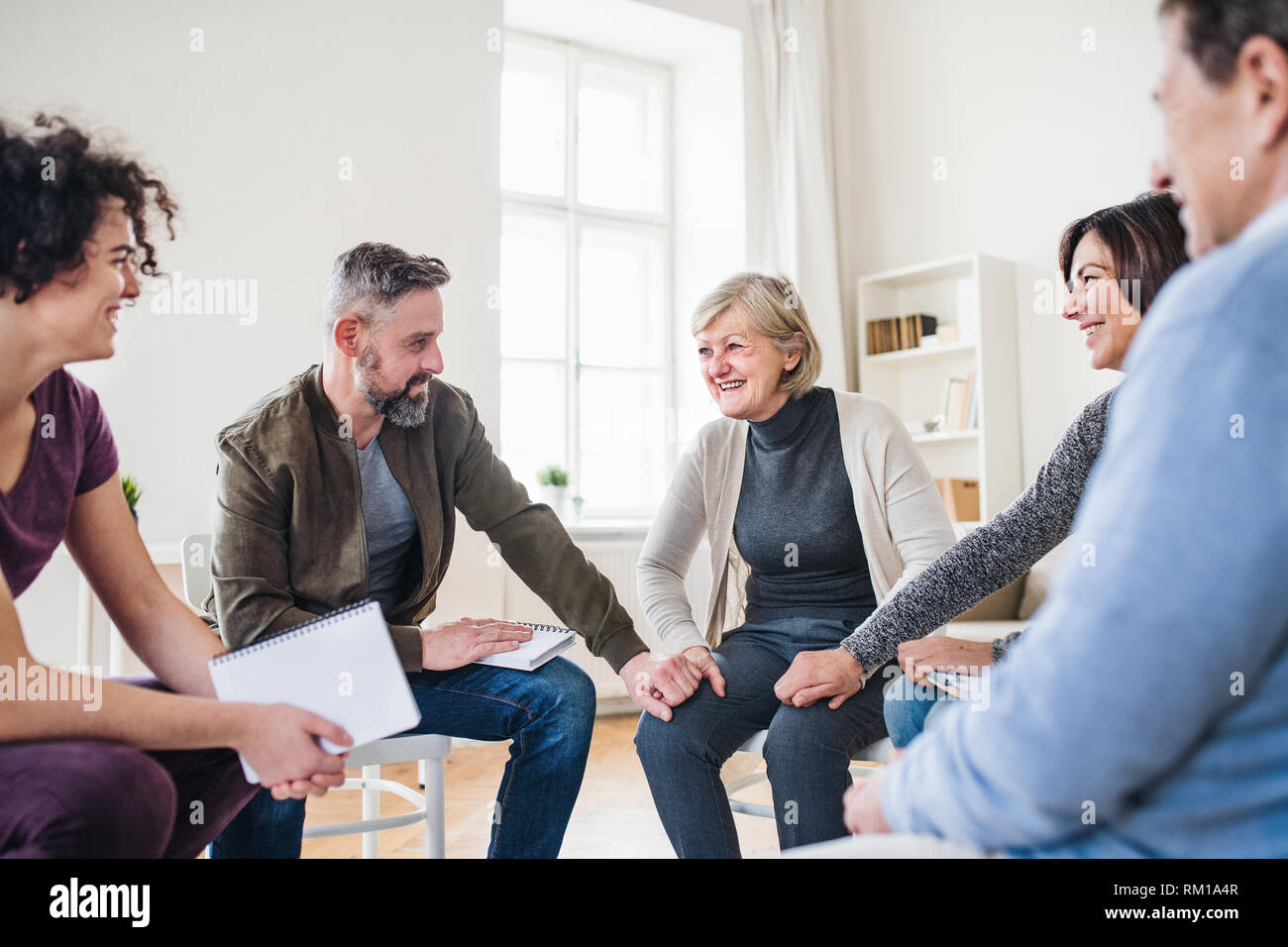Group Circle Sitting Laughing High Resolution Stock Photography and ...