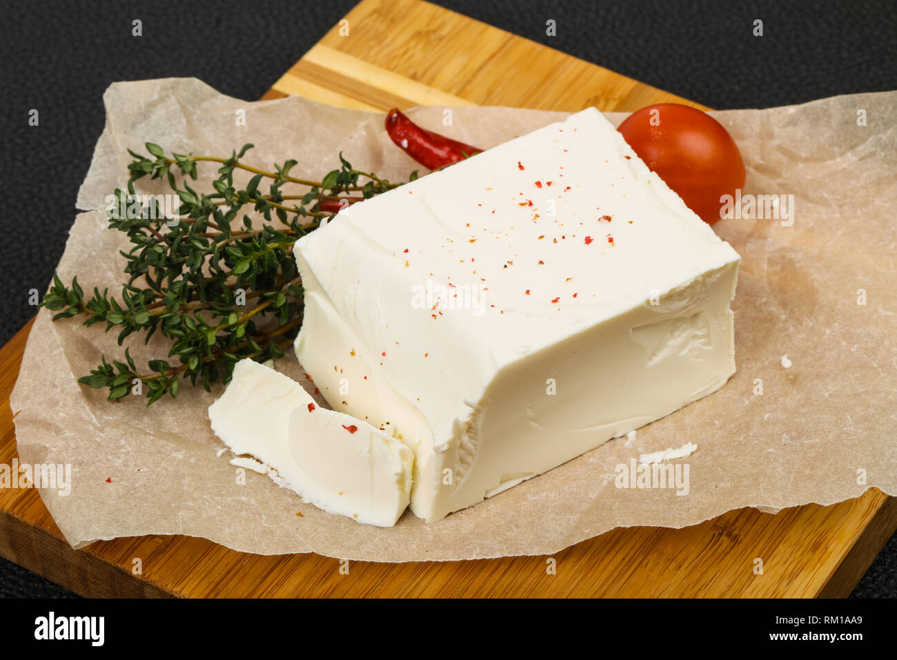 Traditional Feta Cheese served thyme Stock Photo - Alamy