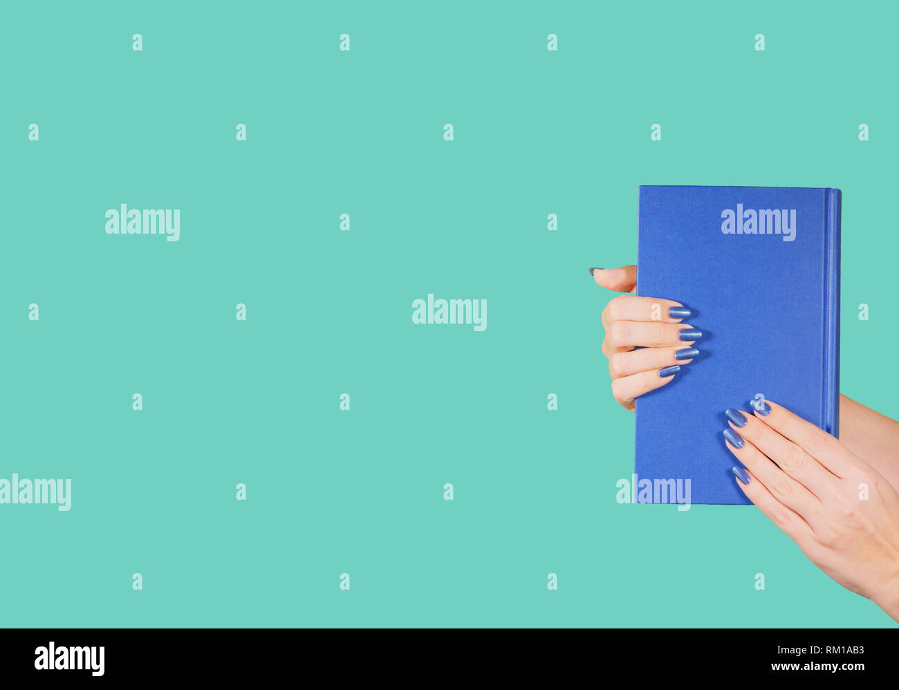 Holding book two hands hi-res stock photography and images - Alamy
