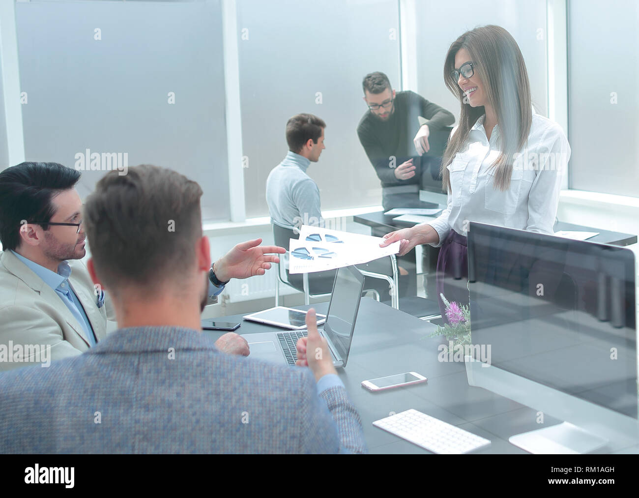 background image of business team in the workplace Stock Photo - Alamy