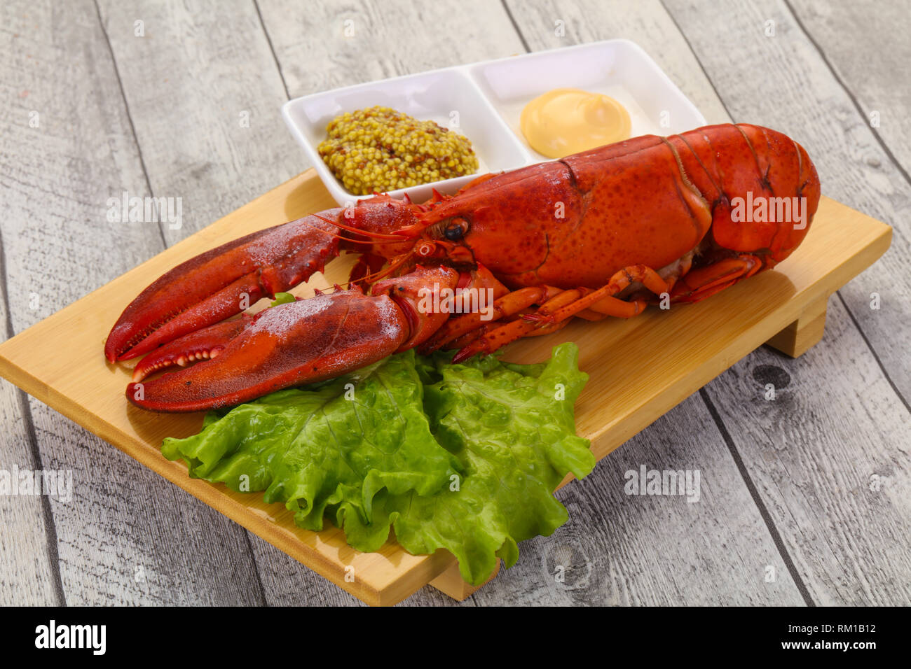 Luxury Lobster with sauces - ready for eat Stock Photo - Alamy