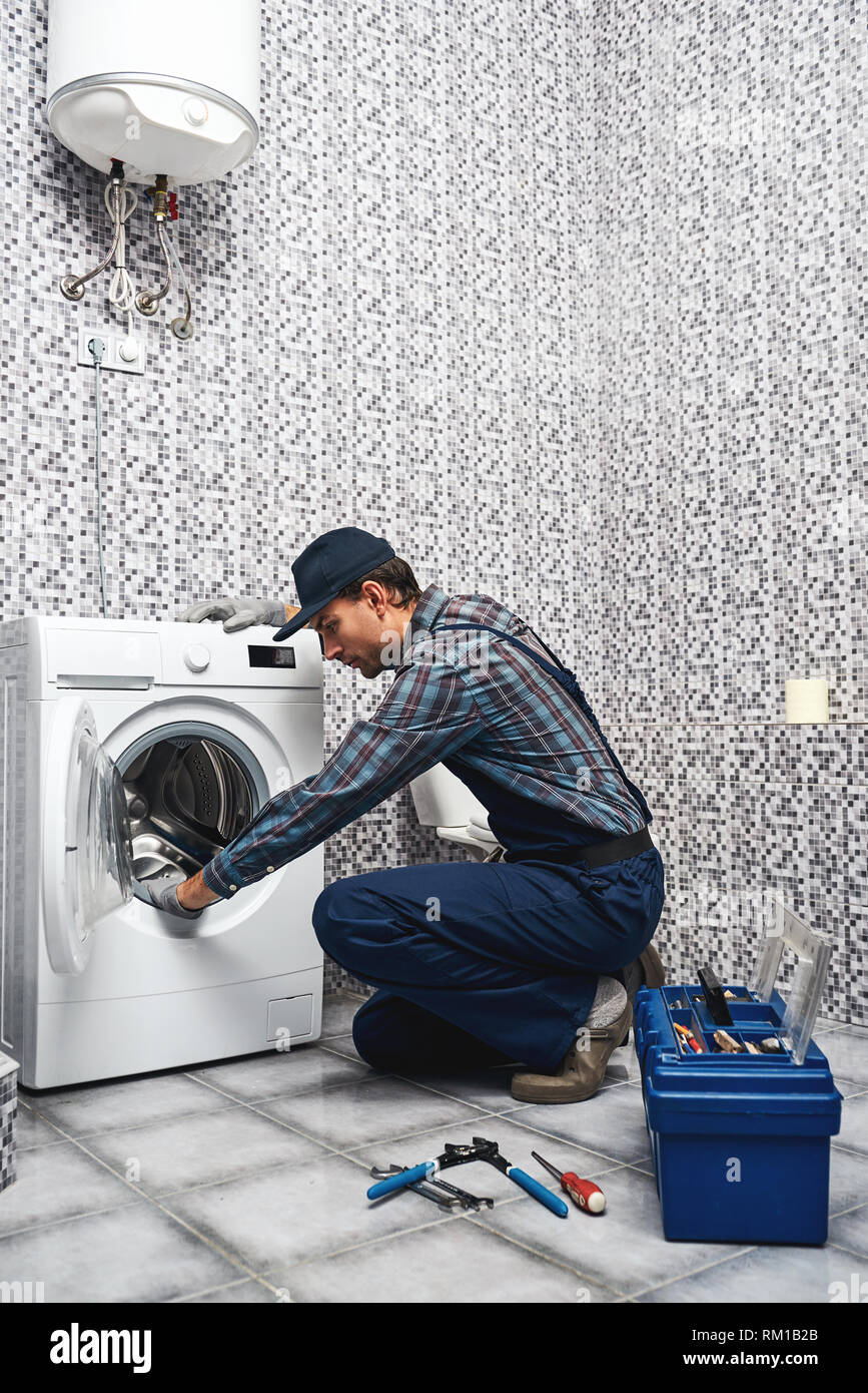 The man and the machine hi-res stock photography and images - Alamy