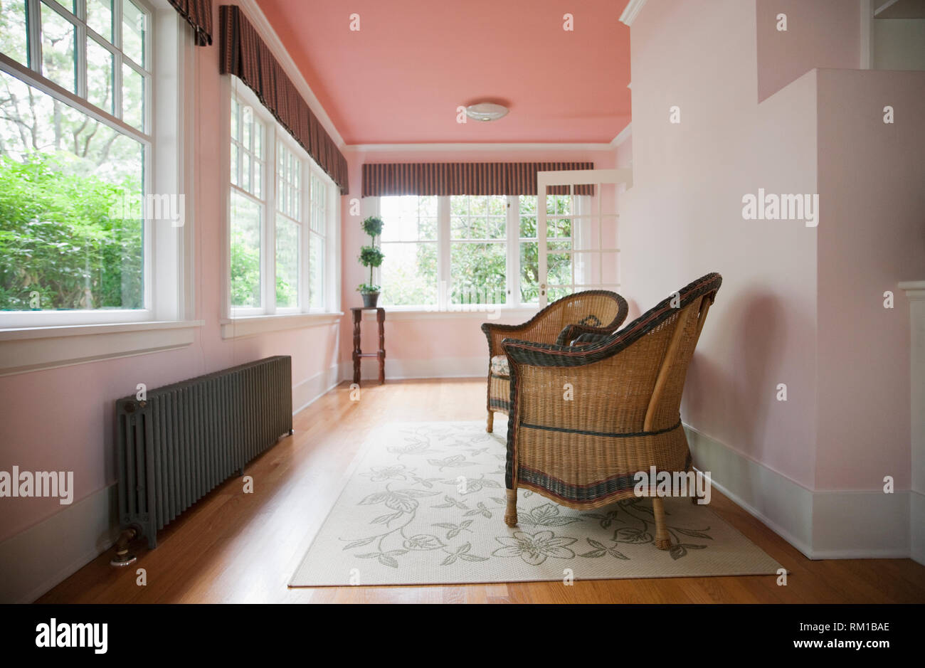Sitting area facing windows Stock Photo - Alamy