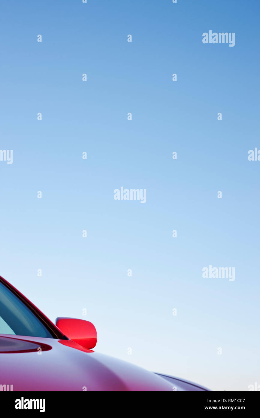 Driver Side Mirror and Hood of Red Car Stock Photo - Alamy