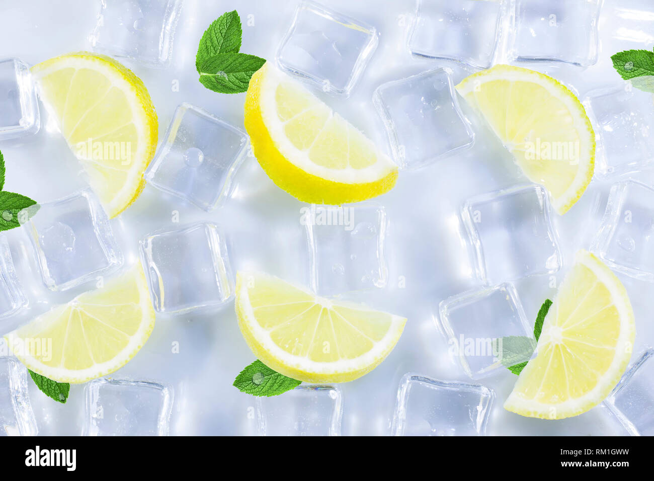 lemon slice and mint on the ice cubes Stock Photo - Alamy