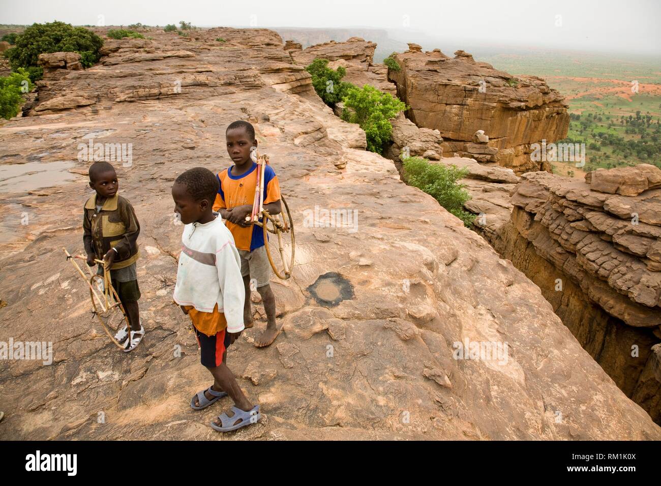 Boys playing wheels hi-res stock photography and images - Alamy