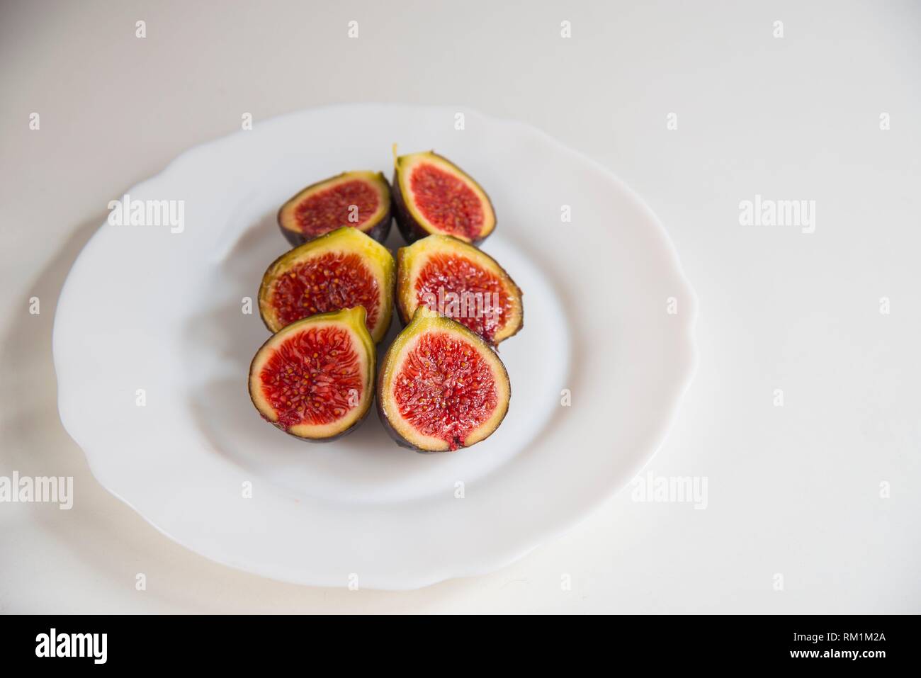 Cut into two halves hi-res stock photography and images - Alamy