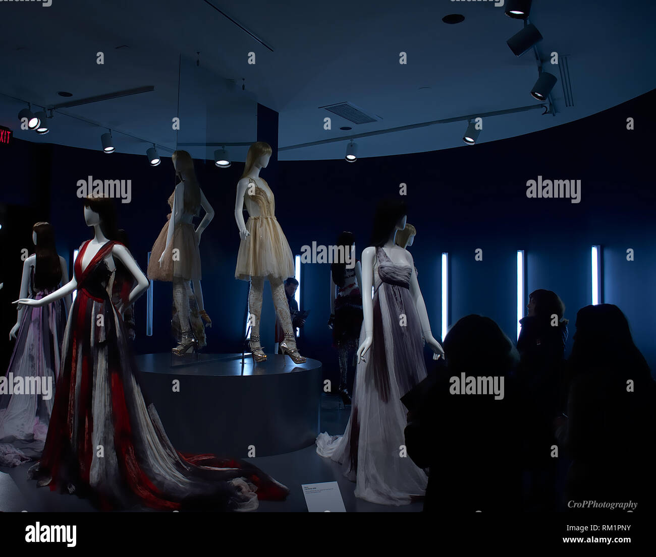 Visitors look at fashion exhibit in the National Museum of Women in Art ...