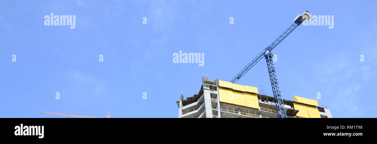 Construction site. High rise multi storey buildings under construction ...