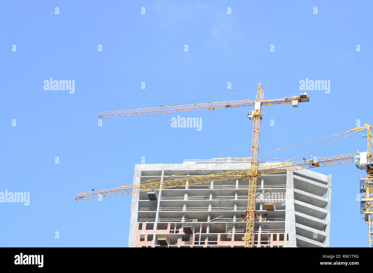 Construction site. High rise multi storey buildings under construction ...