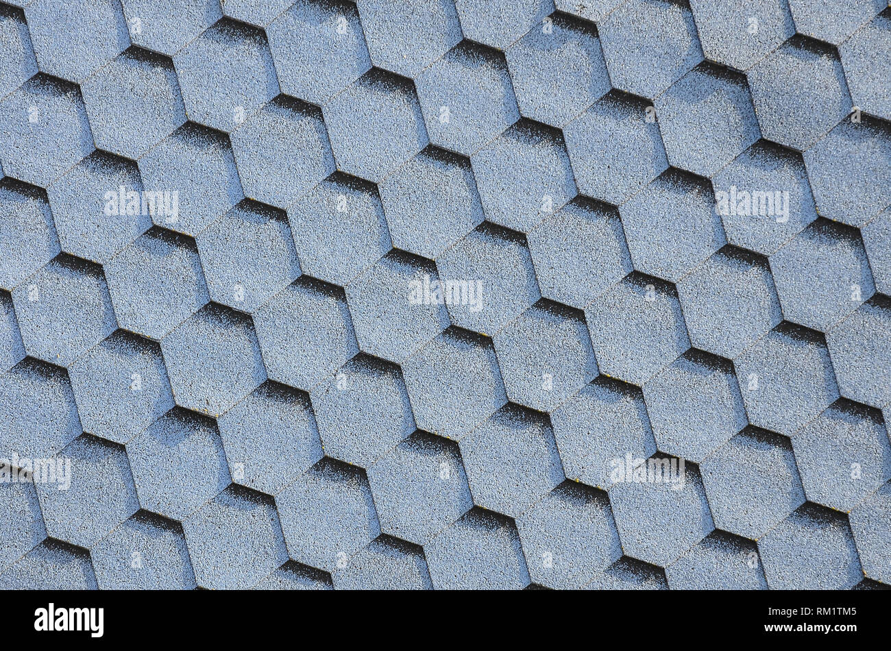 Modern roofing and decoration of chimneys. Flexible bitumen or slate ...