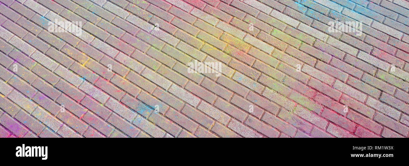 Multi colored earth, paving slabs, powder coated with dry colors at the ...