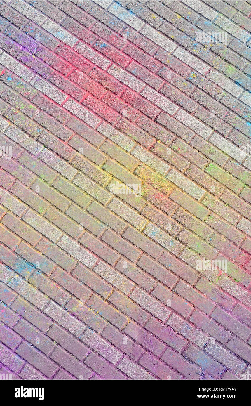 Multi colored earth, paving slabs, powder coated with dry colors at the ...