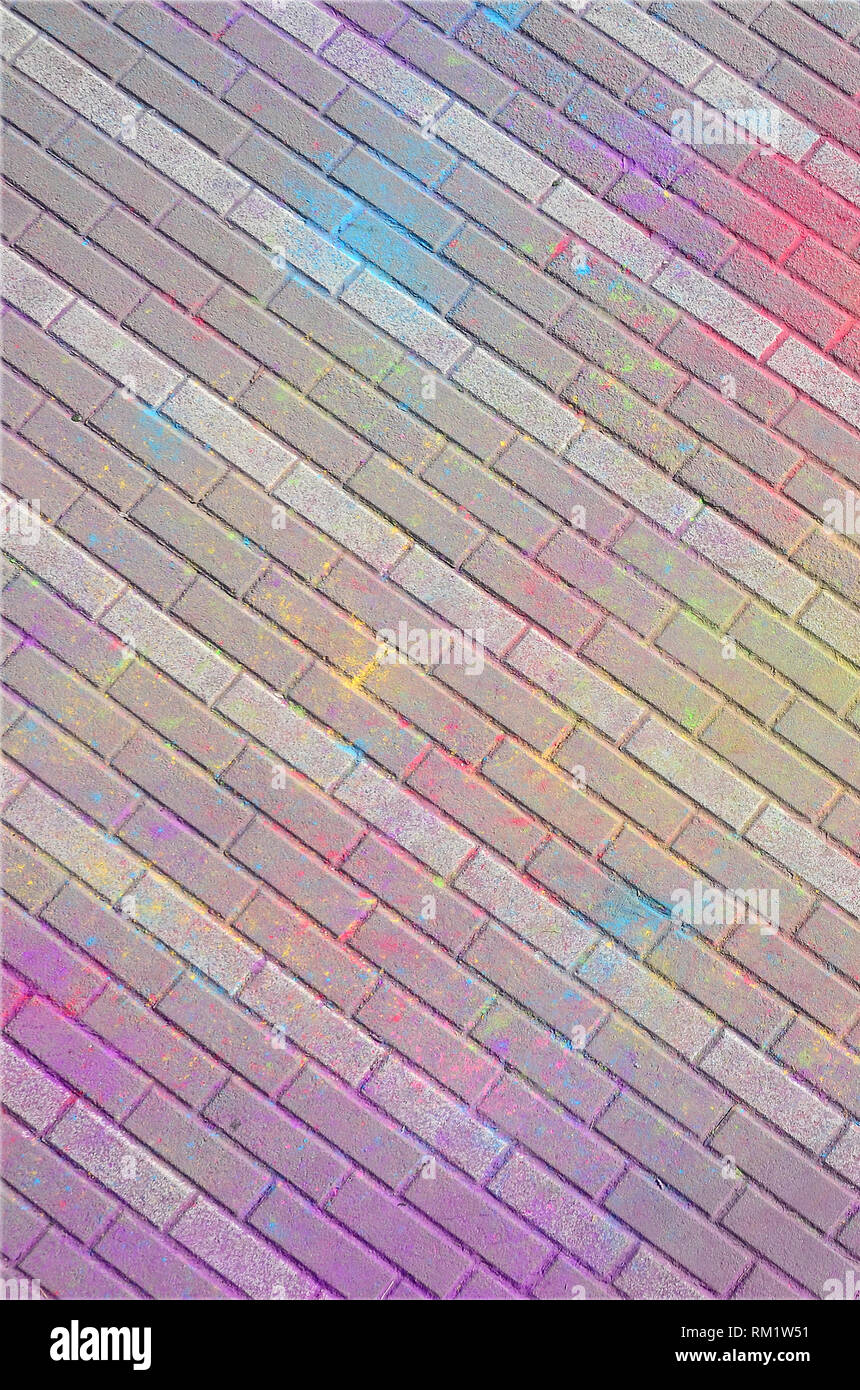 Multi colored earth, paving slabs, powder coated with dry colors at the ...