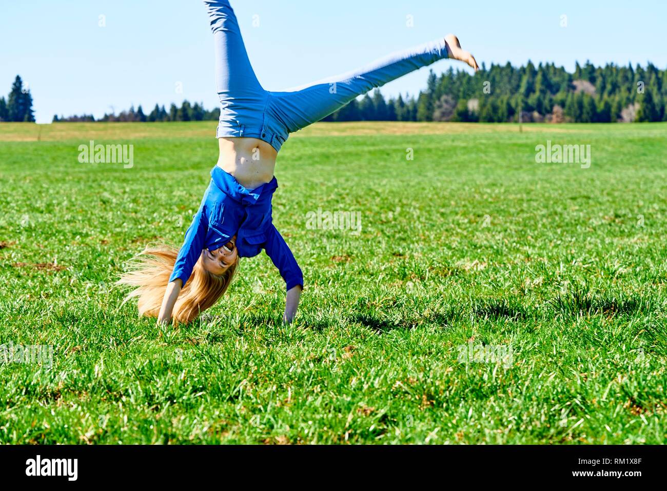 Female cartwheel hi-res stock photography and images - Alamy