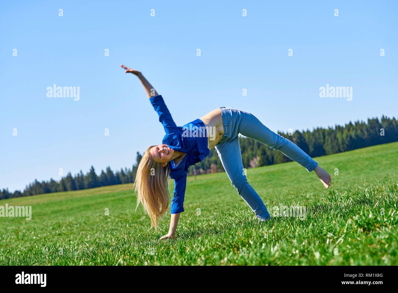 Woman Cartwheel High Resolution Stock Photography and Images - Alamy