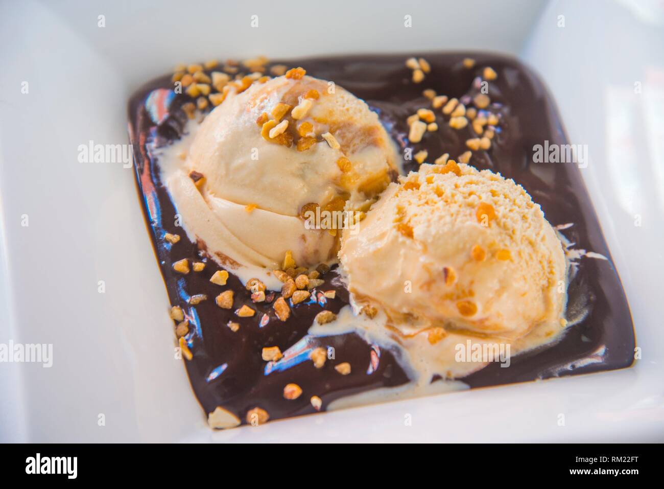 Ice cream chocolate sauce nuts hi-res stock photography and images - Alamy