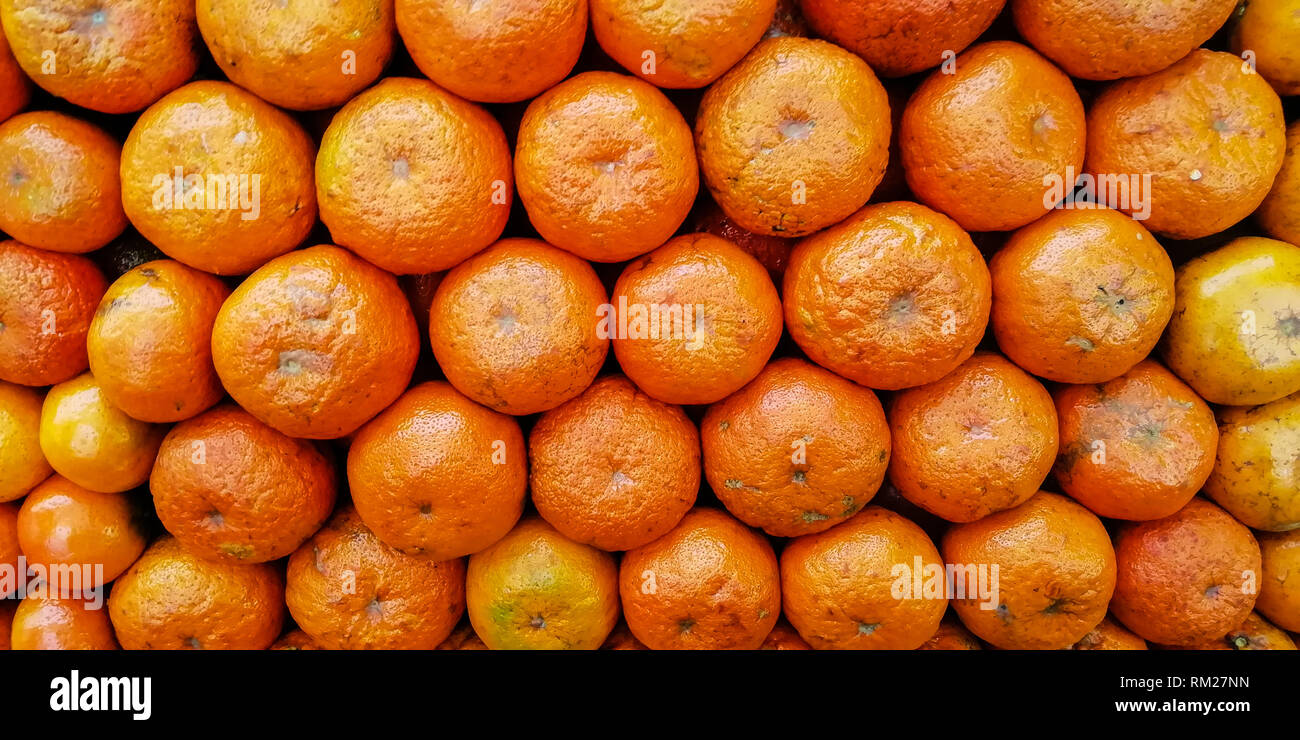close up to a stack of fresh mandarins Stock Photo - Alamy