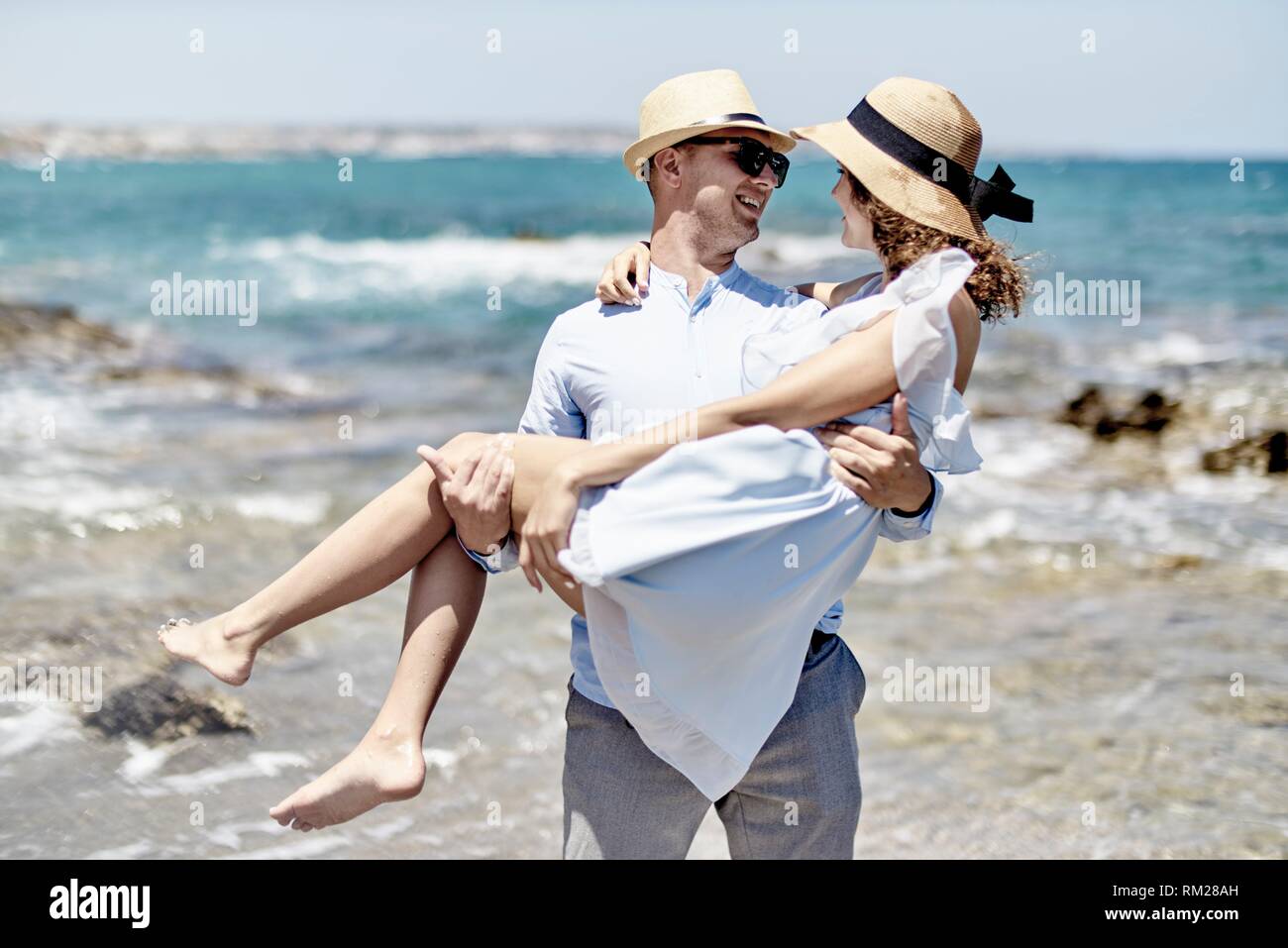 Flirt woman caucasian man beach hi-res stock photography and images - Alamy