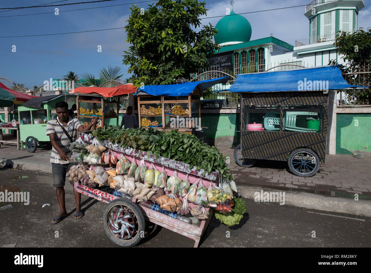 Food sellers, by Masjid An-Nur Mosque, Dili, East Timor Stock Photo - Alamy