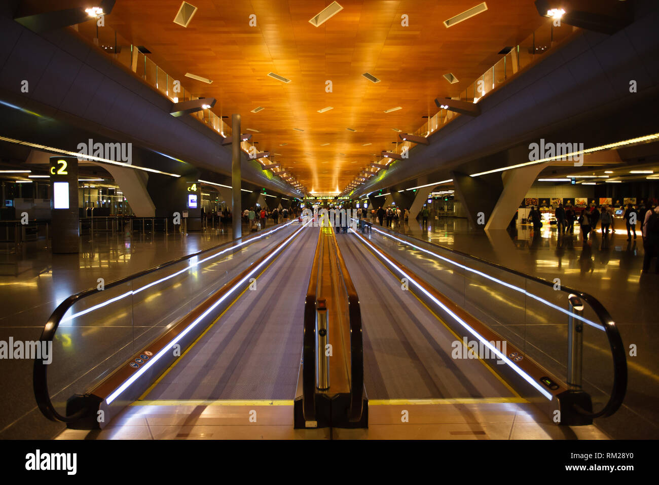 Moving walkway in a modern airport, perspective view Stock Photo - Alamy