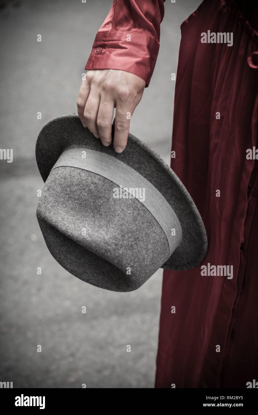 Holding up hat hi-res stock photography and images - Alamy