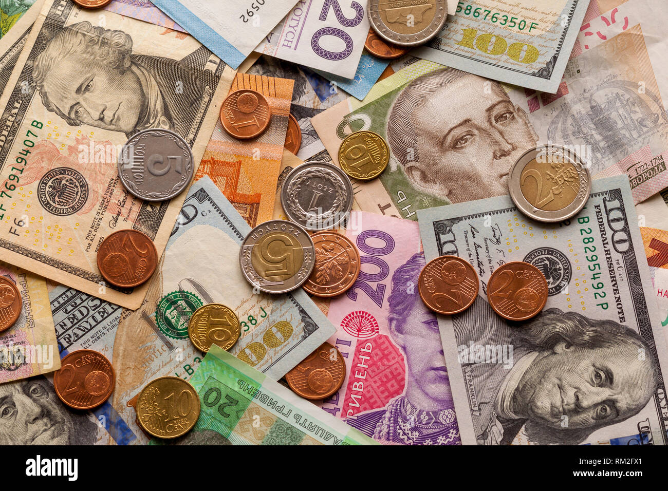 Colorful abstract background made of different metal coins, American ...