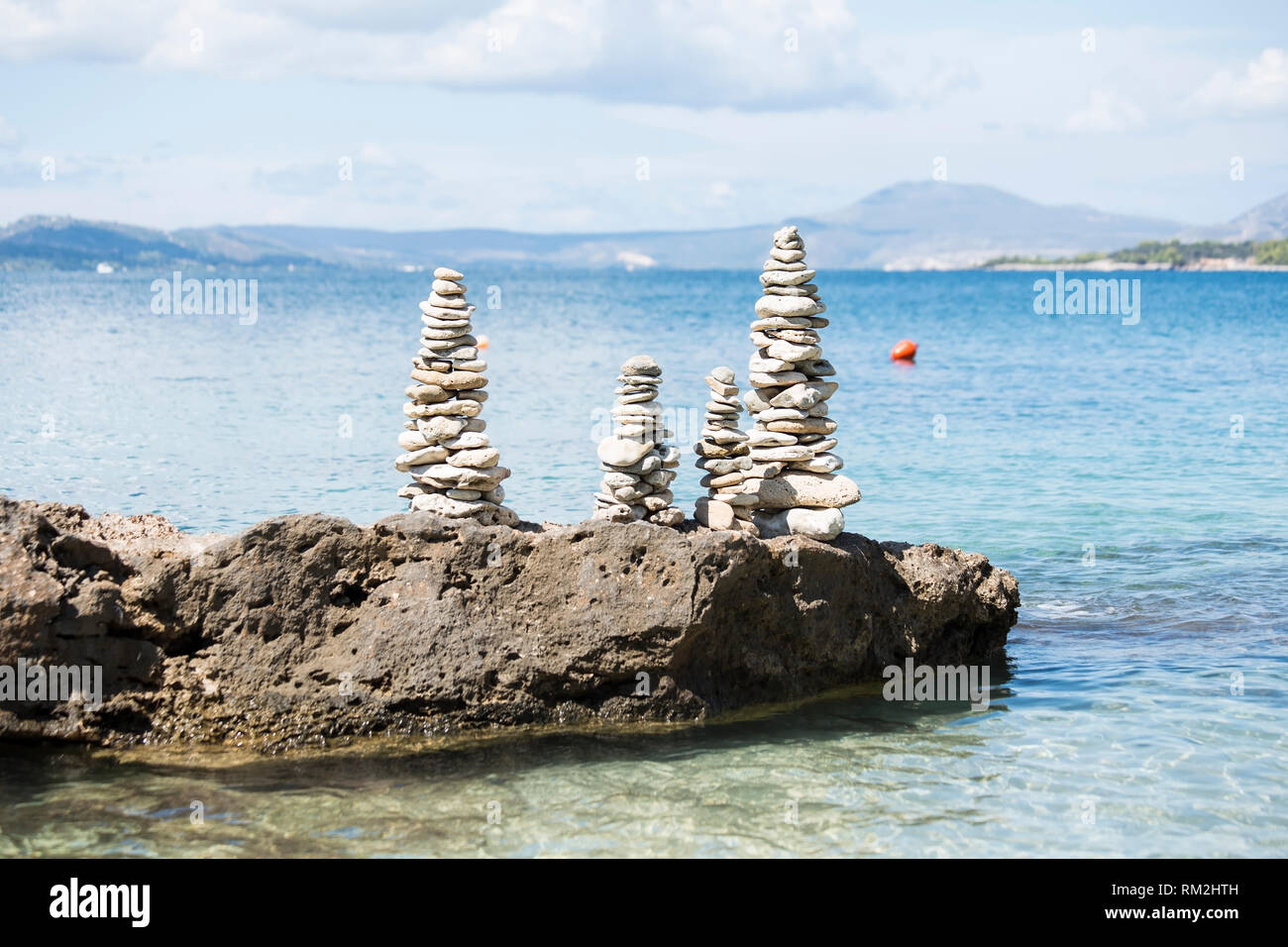 Stacks of stones on the rock Stock Photo - Alamy