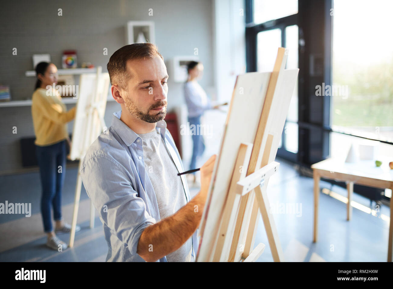 A painter in the workroom Stock Photo - Alamy