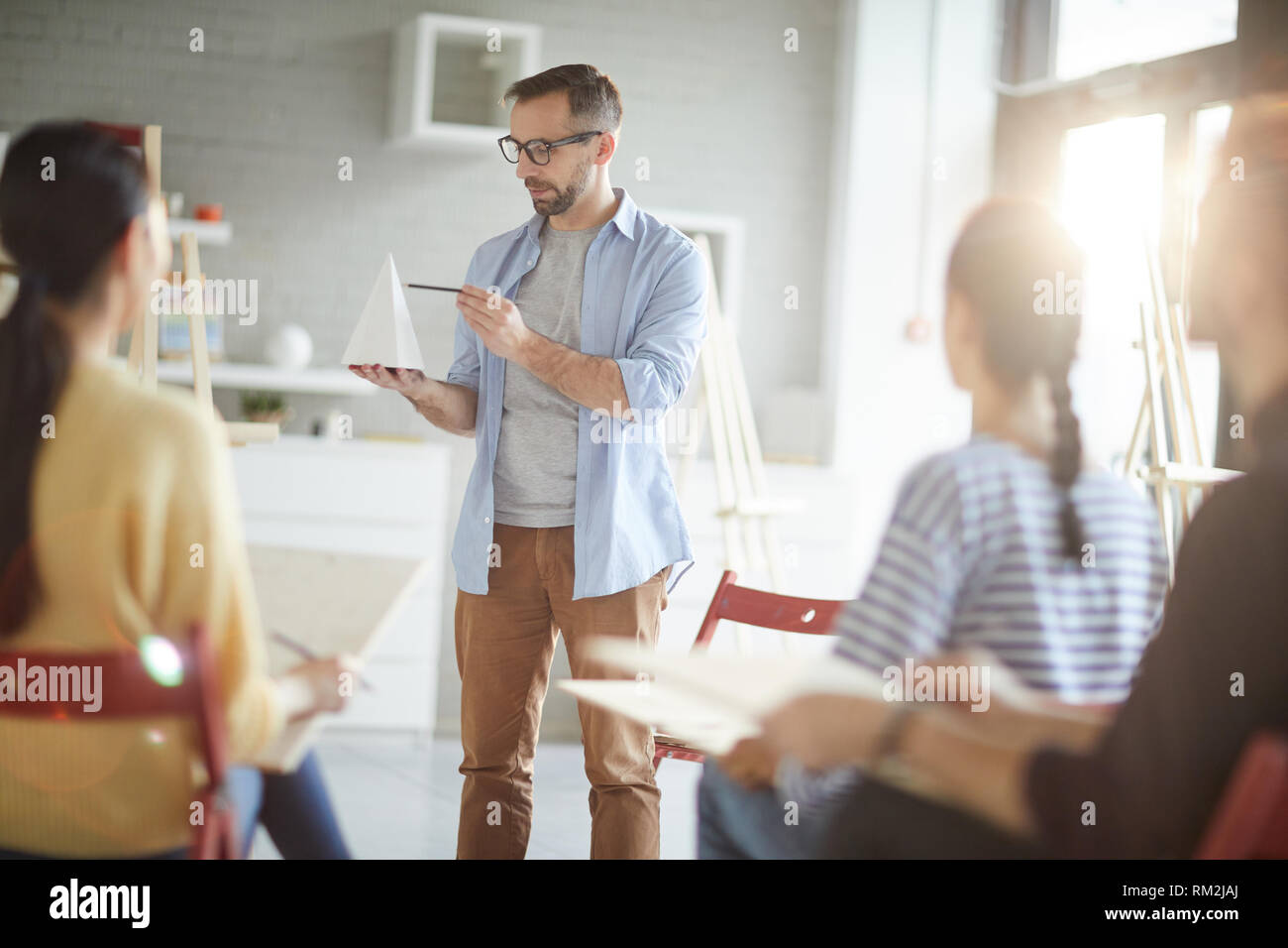 Scholar pointing hi-res stock photography and images - Alamy