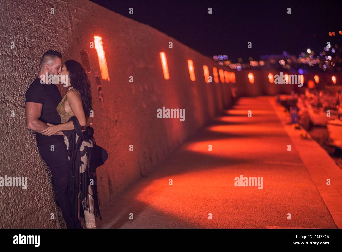 Couple kissing in night light hi-res stock photography and images - Alamy