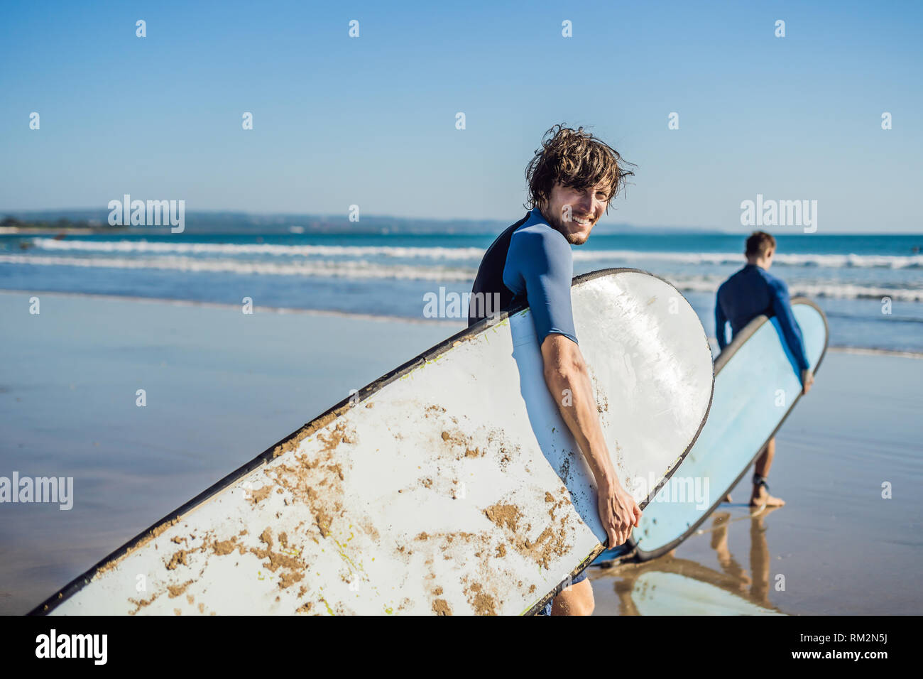 Handsome surfer posing surfboard hi-res stock photography and images ...