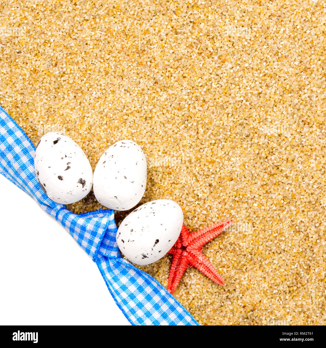 easter abstract gift card on sand textured background with easter eggs ...