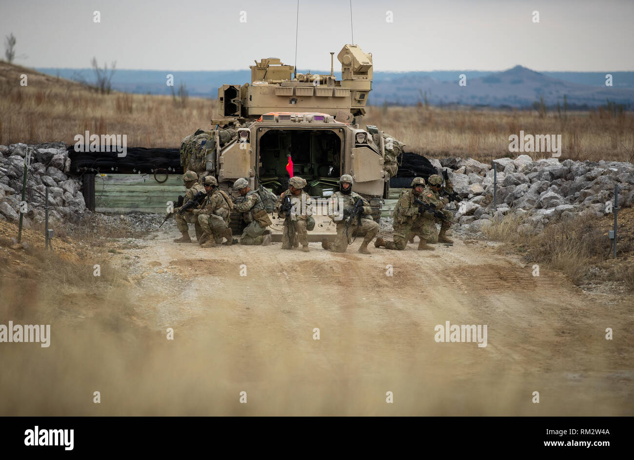 Soldiers from 1-5 Cav, 2BCT, 1CD dismount their Bradley Fighting ...