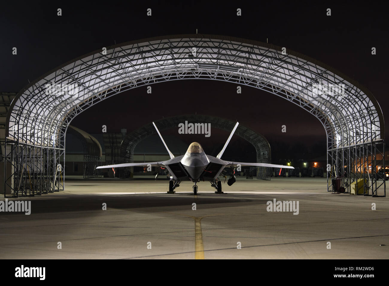 A United States Air Force F-22 Raptor is parked on the flight line on ...