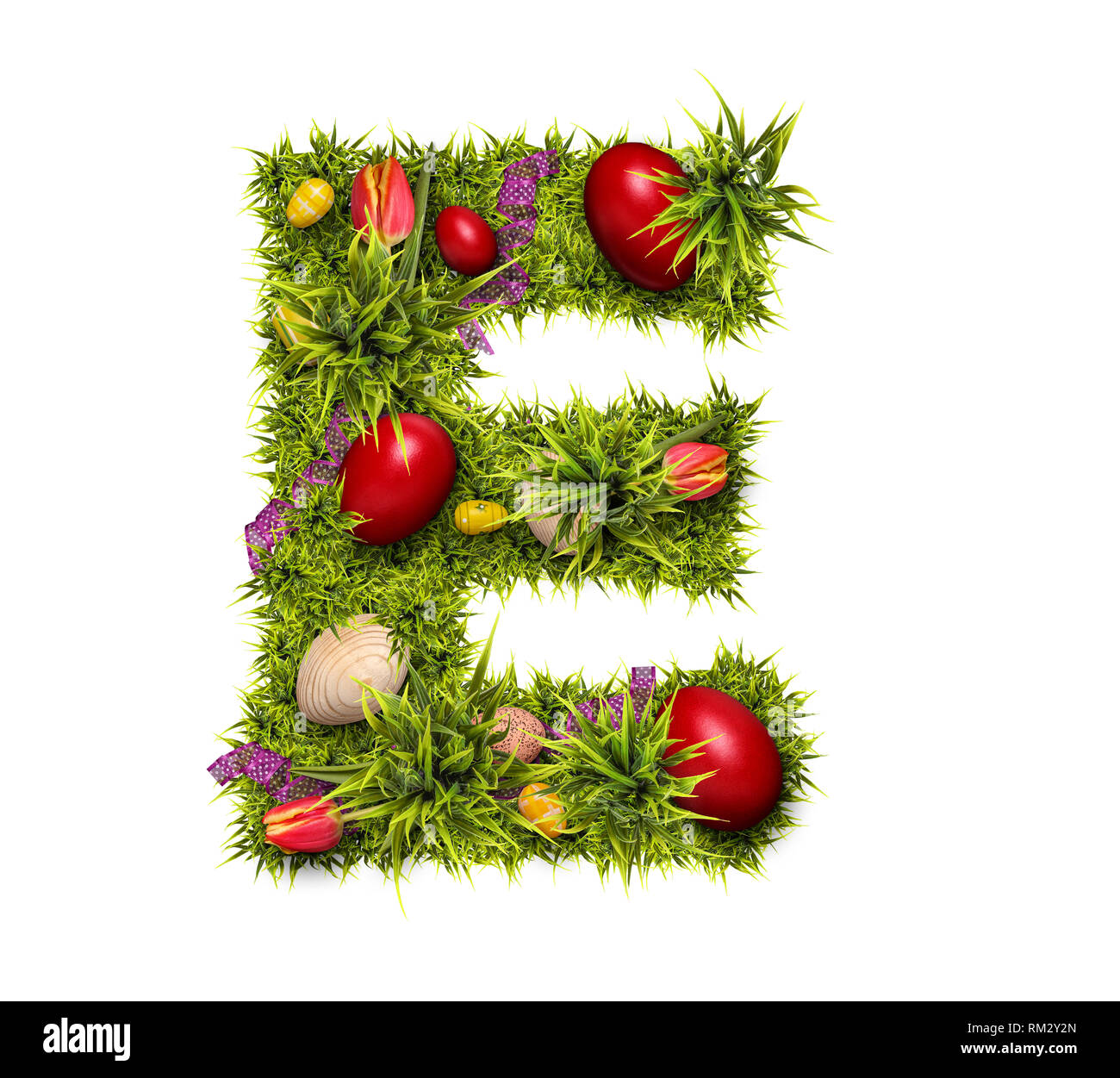 Easter holiday letter E made of fresh green grass and Easter eggs ...