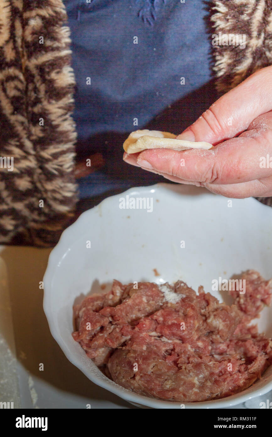Raw and fresh is stuck on the dumplings are on the Board Stock Photo ...