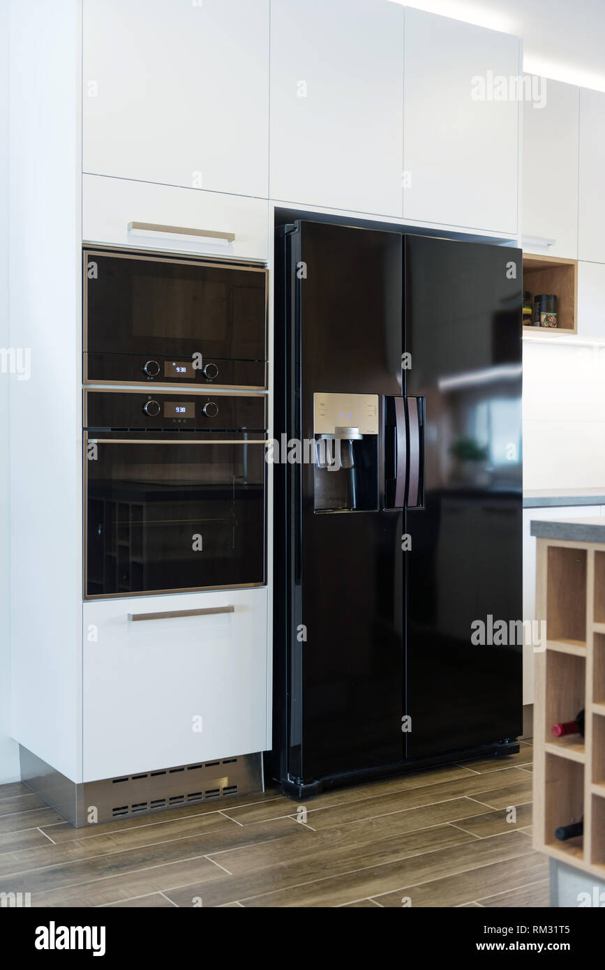 Interior of modern kitchen with built-in appliances Stock Photo - Alamy