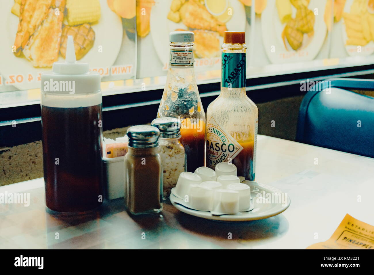Condiments on diner table hi-res stock photography and images - Alamy