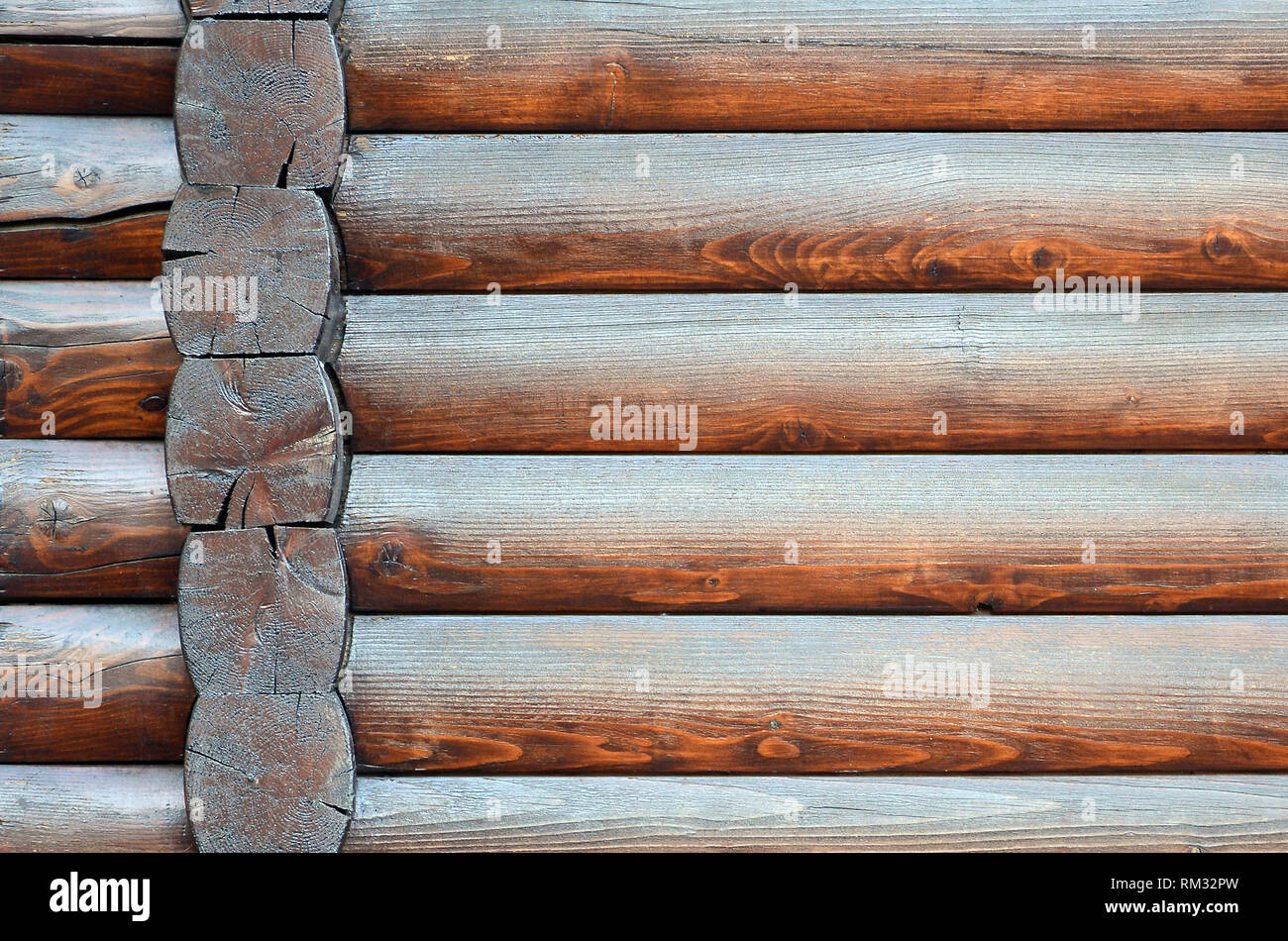 Hewn timber. Rustic log wall horizontal timber background. Fragment of ...