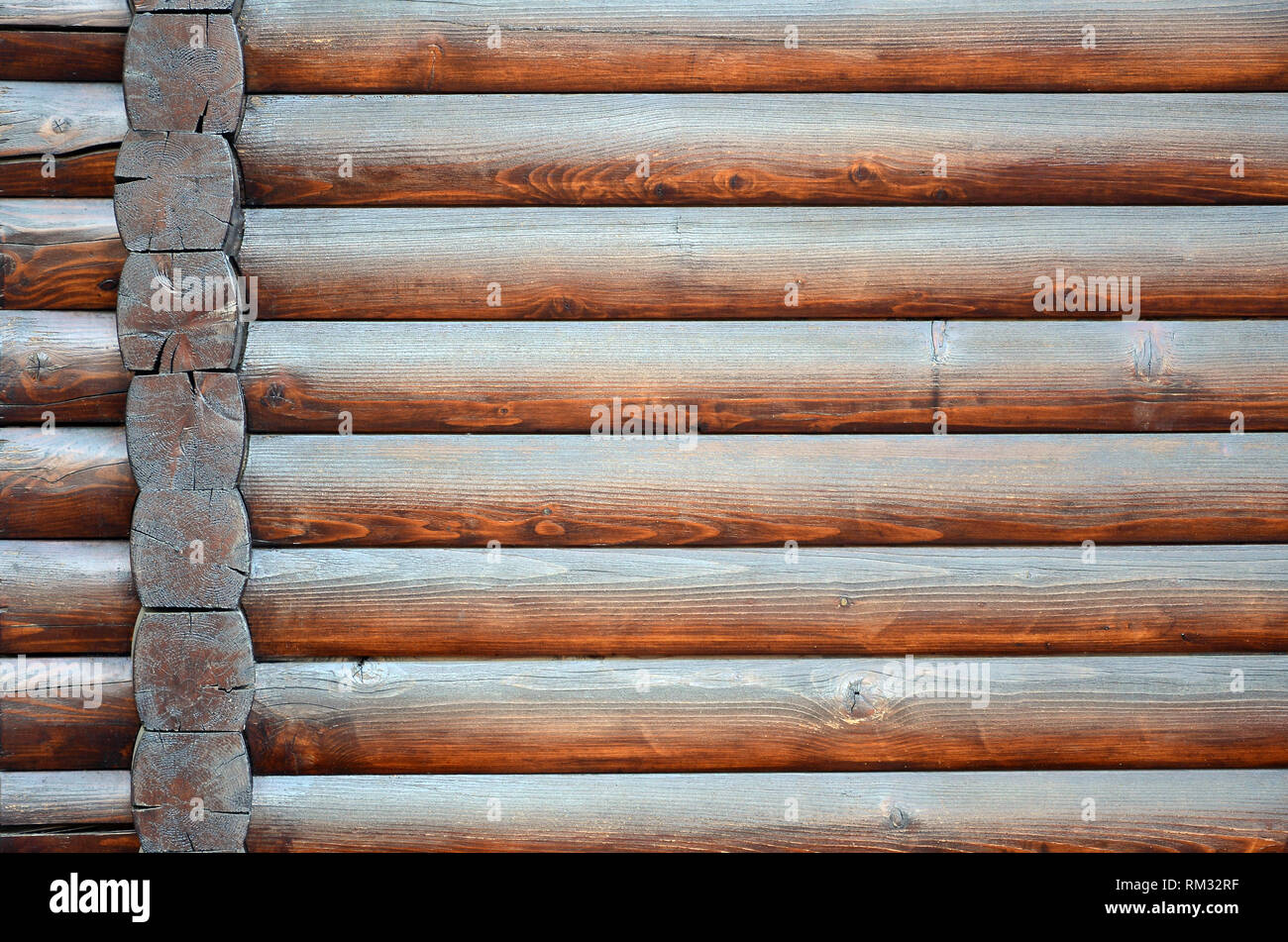 Hewn timber. Rustic log wall horizontal timber background. Fragment of ...